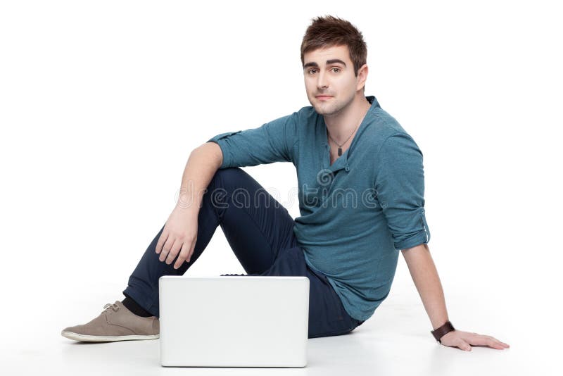 Young Man Sitting Behind Laptop Stock Photo - Image of portrait ...
