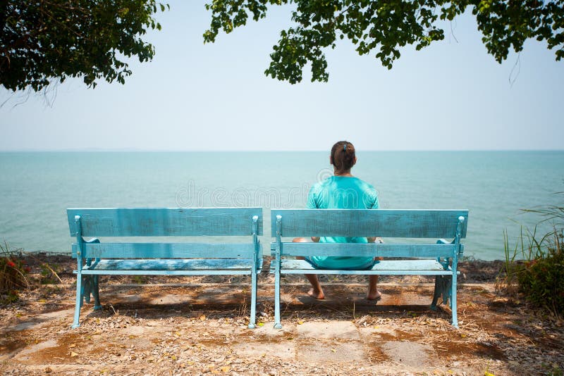 Young Man Sitting on Bench Facing the Sea Stock Photo - Image of dream ...