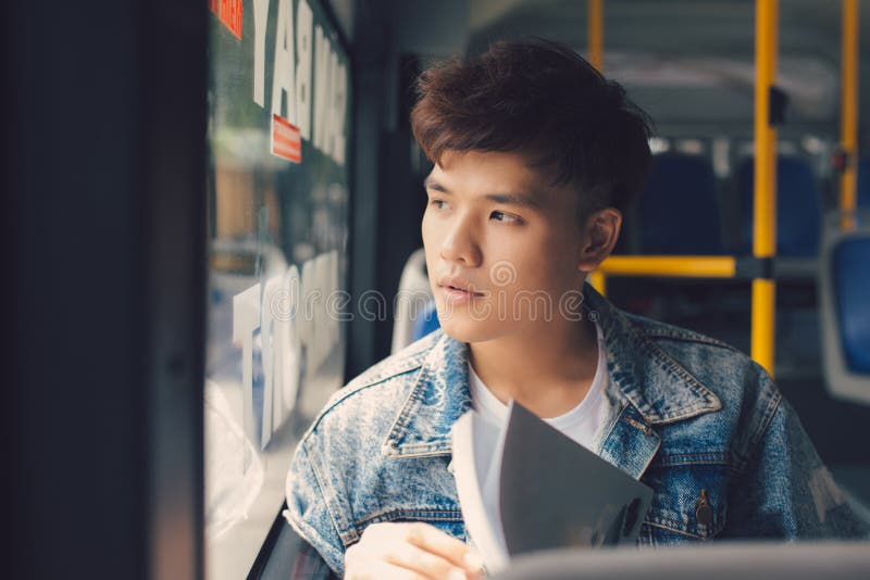 179 Man Reading Book Bus Top Stock Photos - Free & Royalty-Free Stock ...