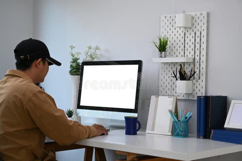 Young Man Sitting in Workplace and Working from Home with Computer ...