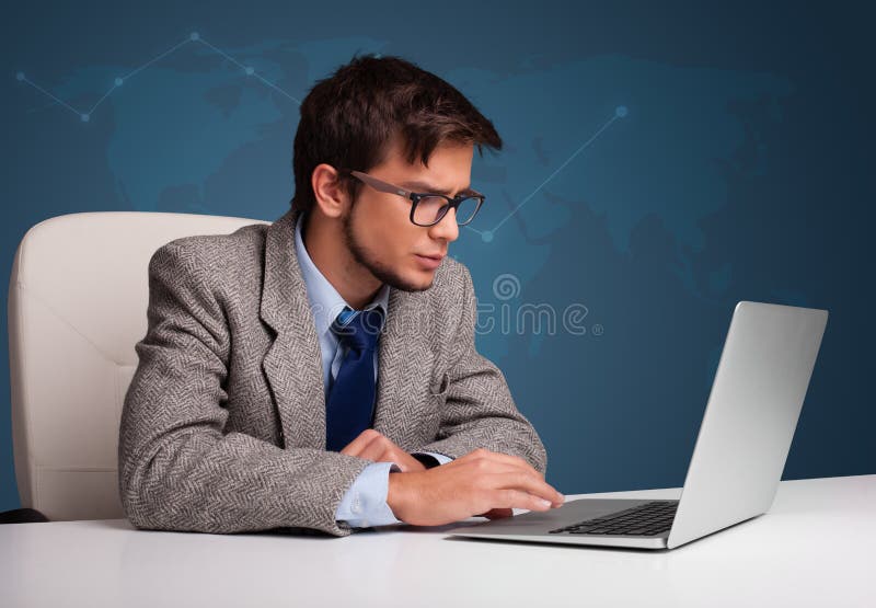 Young Man Sitting at Desk and Typing on Laptop Stock Image - Image of ... Young Man Sitting at Desk and Typing on Laptop Stock Image - Image of ...