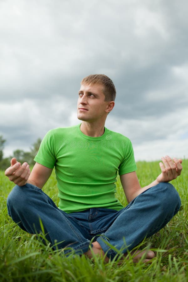 Young Man Sitting On The Grass Stock Image Image Of Jeans Rest 20666399