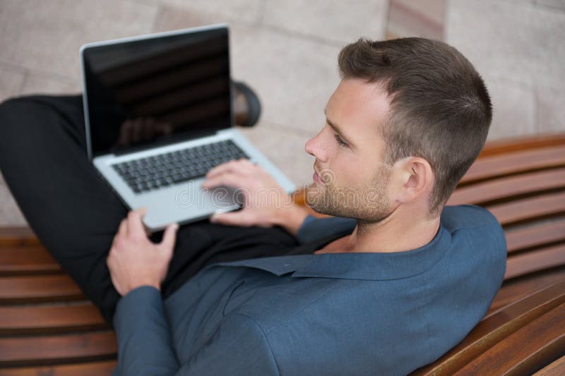 Young Man Sitting with His Laptop Stock Image - Image of internet ...