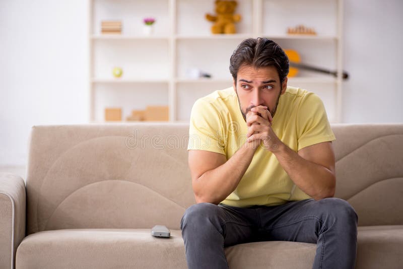 Young Man Sitting at Home during Pandemic Stock Image - Image of ...