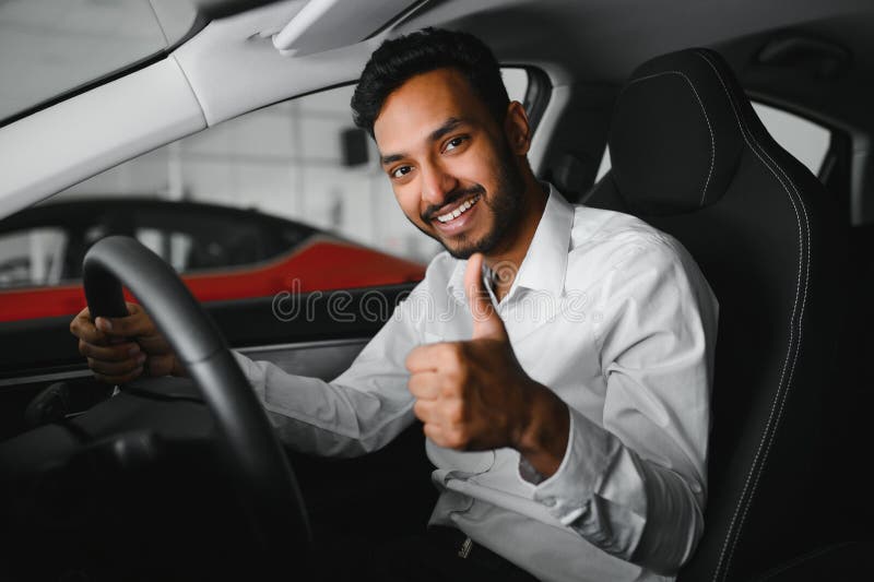 Young Man Sitting Inside New Car. Smiling Stock Image - Image of male ...