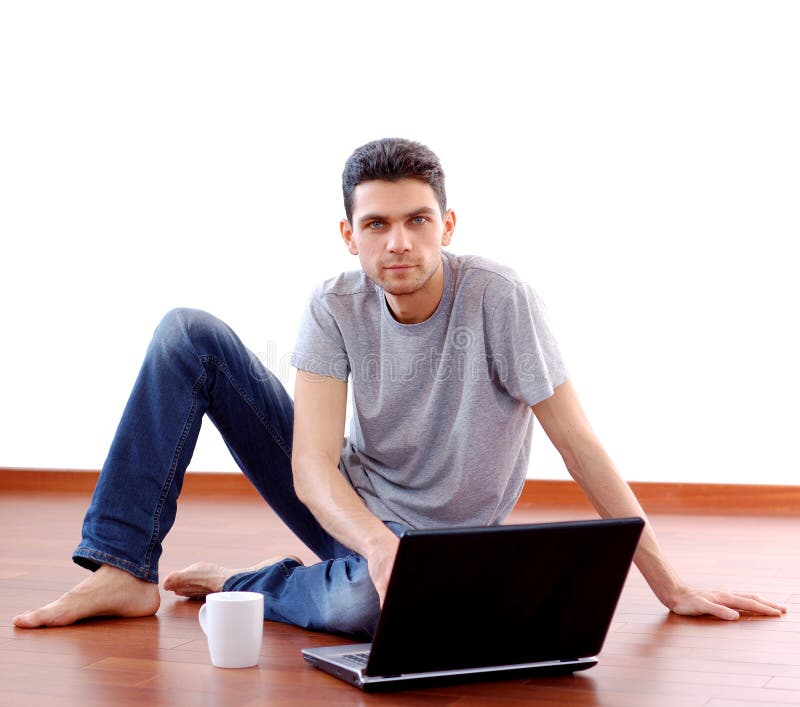 Young Man Sitting with Laptop at Home Stock Photo - Image of laptop ...
