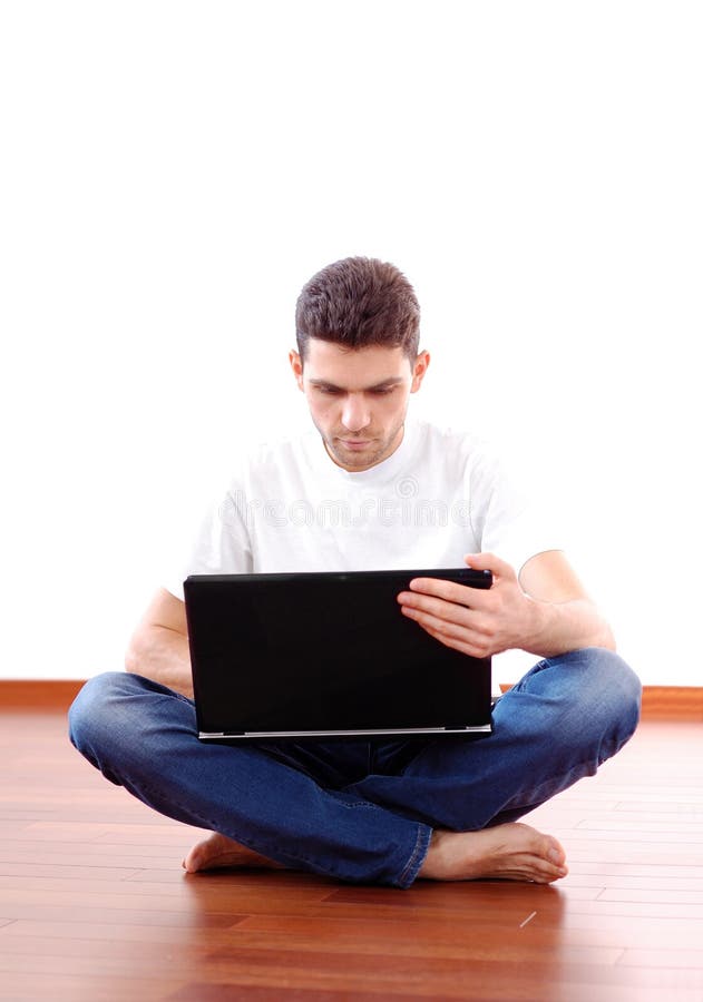 Young Man Sitting with Laptop at Home Stock Photo - Image of laptop ...