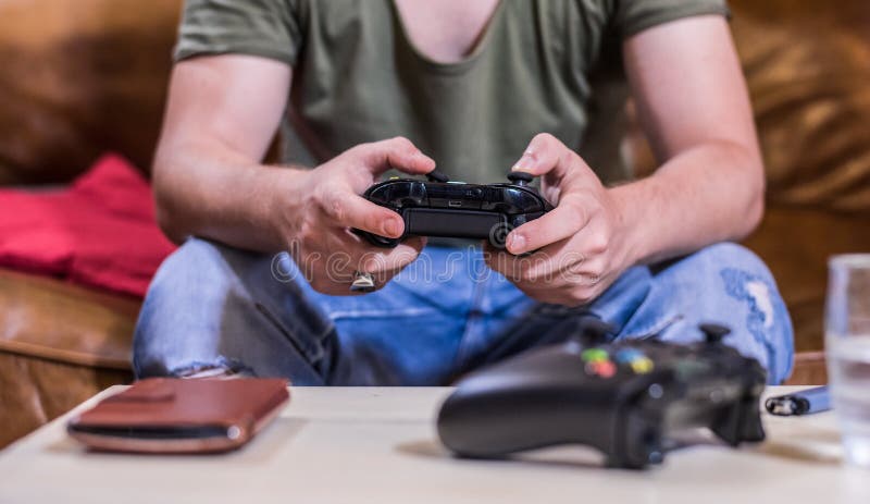 Gamer using the controller stock image. Image of anger - 98171269