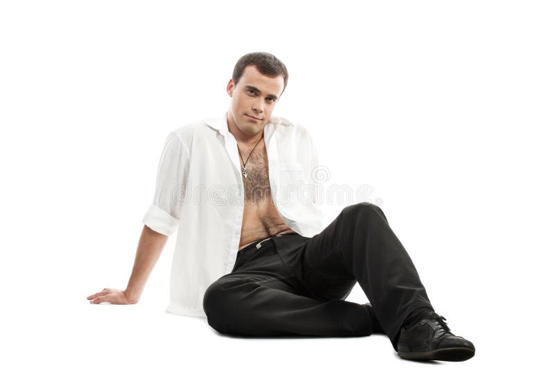 Young Man Sitting and Looking at Camera Stock Image - Image of ...