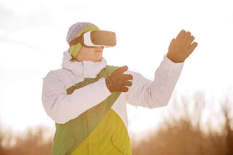 Young Man Sitting on the Snow with Snowboard and Vr Glasses Stock Image ...