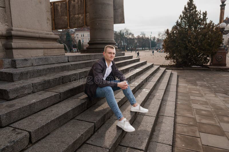 Young Man Sitting Stone Steps Urban Park Setting Stock Photos - Free ...