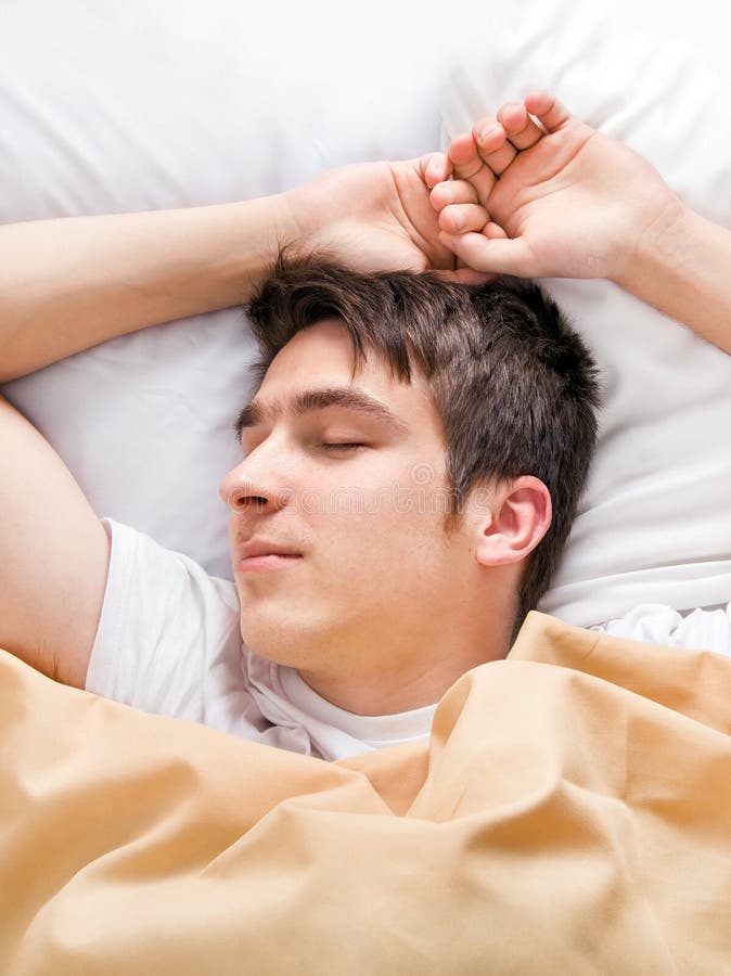 Young Man sleeping stock photo. Image of fatigued, rest - 239988804