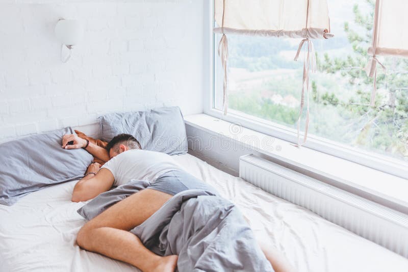 Young Man Sleeping Late in the Morning Stock Image - Image of adult ...