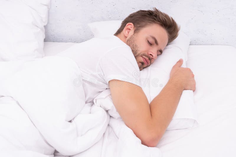 Young Man Sleeping or Napping at Home in Bed at White Bedroom Stock ...