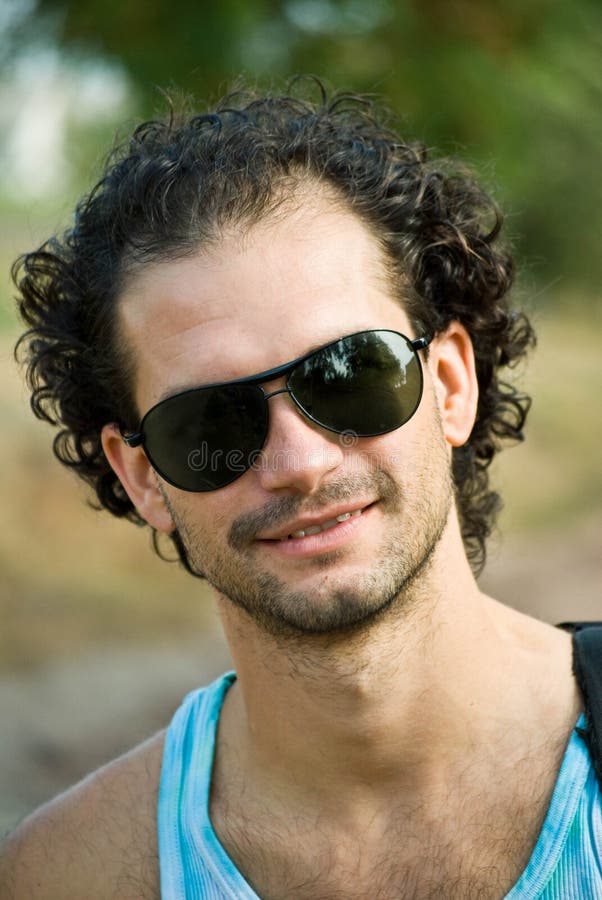 Portrait of a Handsome Spanish Man Smiling at the Camera Stock Photo ...