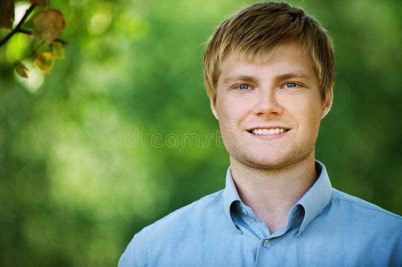 Young man smiling stock photo. Image of eyes, closeup - 21267596
