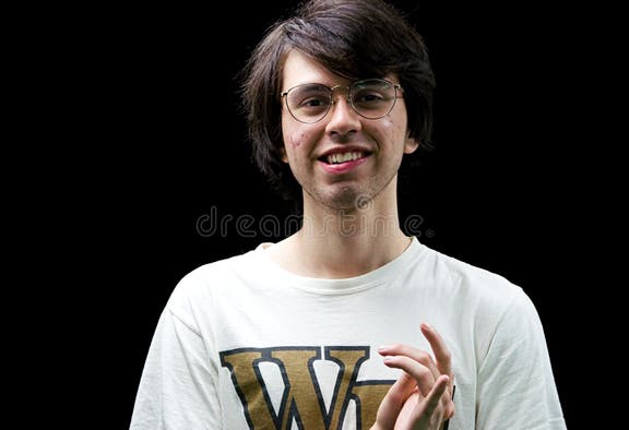 Young Man Smiling at the Camera Stock Image - Image of shirt, black ...