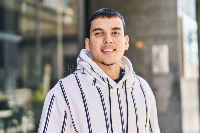 Young Man Smiling Confident Standing at Street Stock Image - Image of ...