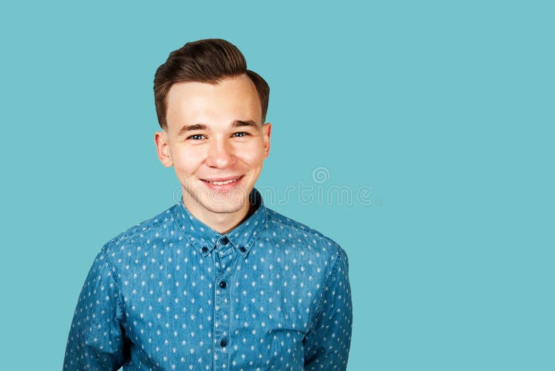 Young Man Smiling And Looking At Camera Portrait Of Handsome Happy