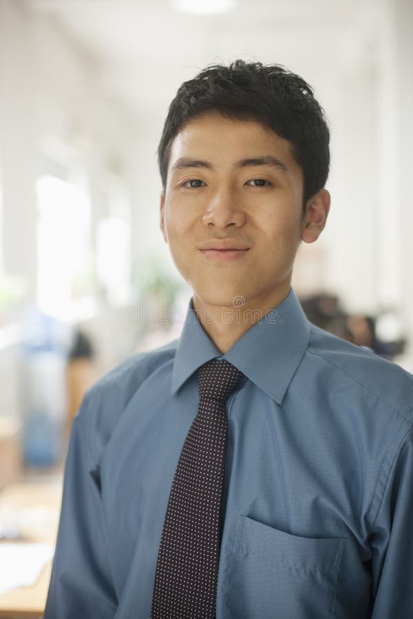 Young Man Smiling in the Office, Portrait Stock Photo - Image of office ...