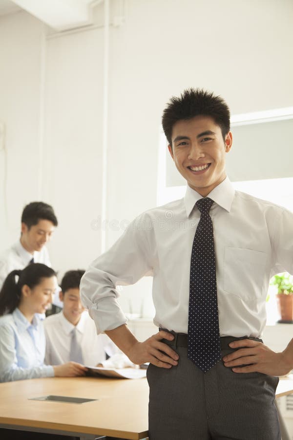 Young Man Smiling in the Office, Portrait Stock Photo - Image of ...