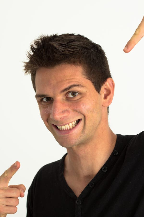 Young Man Smiling and Pointing at Himself Stock Photo - Image of modern ... Young Man Smiling and Pointing at Himself Stock Photo - Image of modern ...