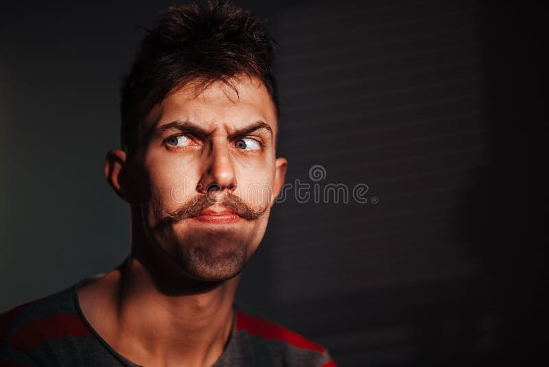 Young Man Smiling in Window Light Stock Image - Image of isolated ...