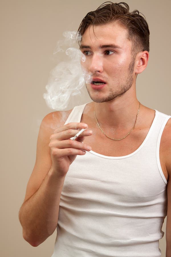 Young man smoking stock image. Image of caucasian, smoke - 20611267