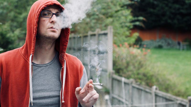 Young Man Smoking Cigarette Stock Image - Image of smoking, cigarette ...