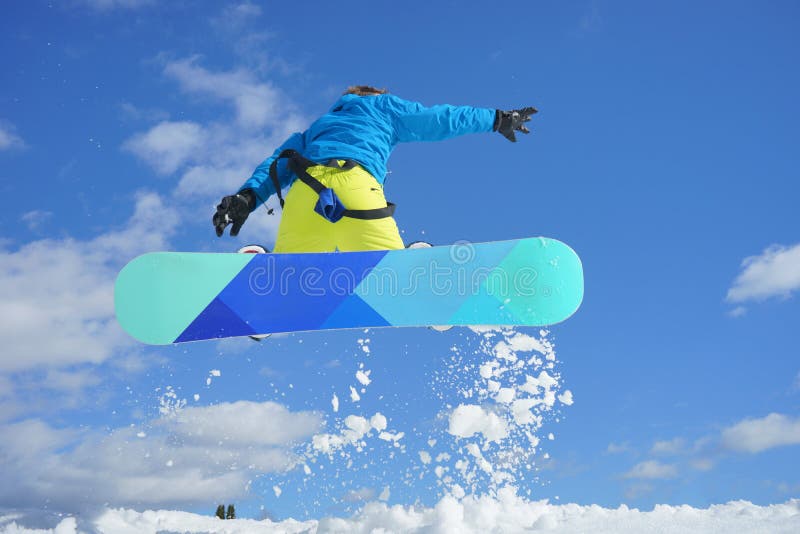 Young man on the snowboard stock photo. Image of jacket - 59747464