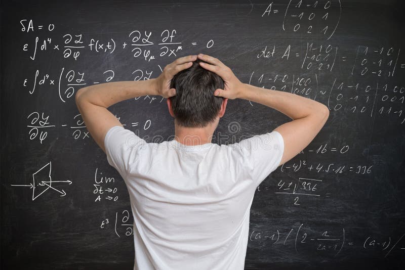 Young Man is Solving Mathematical Problem on Blackboard and is Confused ...