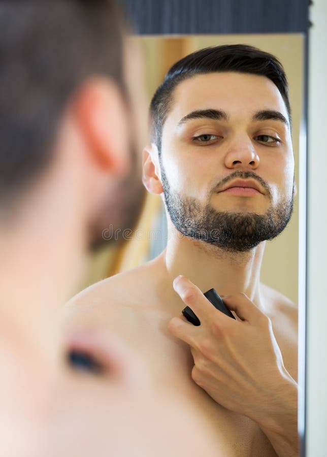 Young Man Spraying Fragrance Perfume Stock Photo - Image of fragrances ...