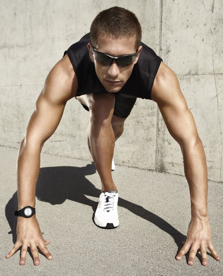 Sport man starting running stock photo. Image of runner - 27313194