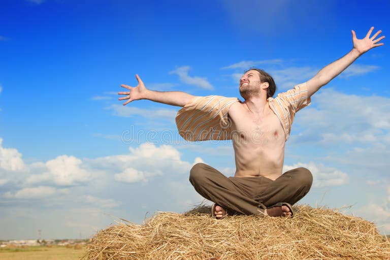 Young Man on the Stack of Hay Stock Image - Image of adult, facial ...