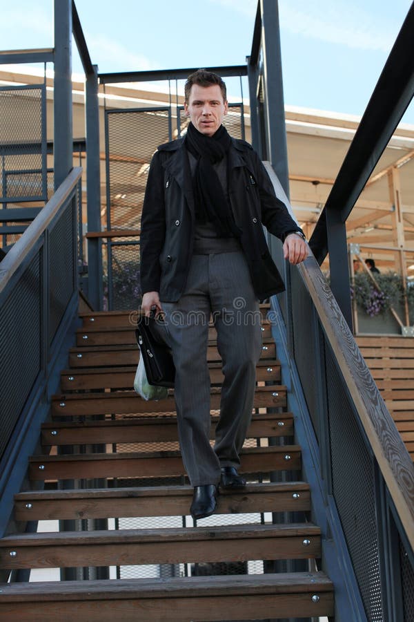 Young man on staircase stock photo. Image of food, wooden - 16474242