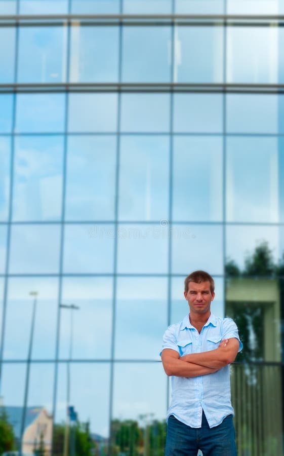 Young Man Stand in Front of Modern Business Building Stock Image ...