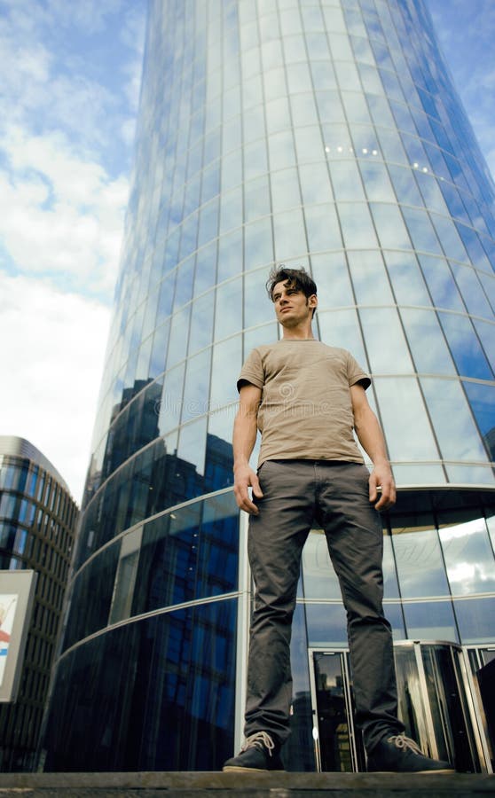 Young Man Stand in Front of Modern Business Stock Image - Image of blue ...