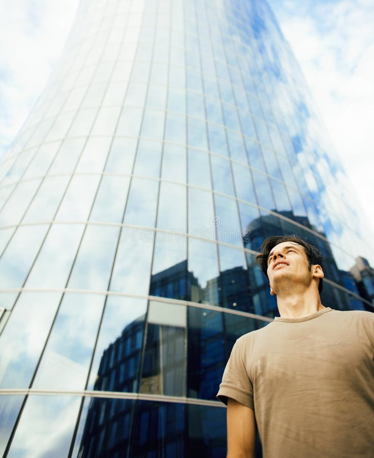 Young Man Stand in Front of Modern Business Building Stock Photo ...