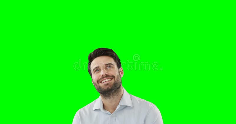 Young Man Standing Against Green Screen Stock Footage - Video of ...