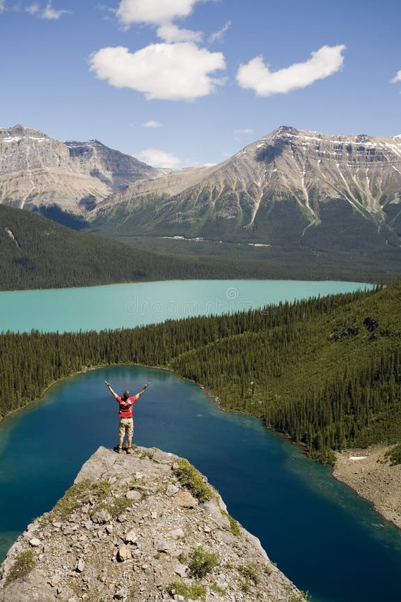 Young Man Standing on Boulder Above Lakes Stock Image - Image of heaven ...