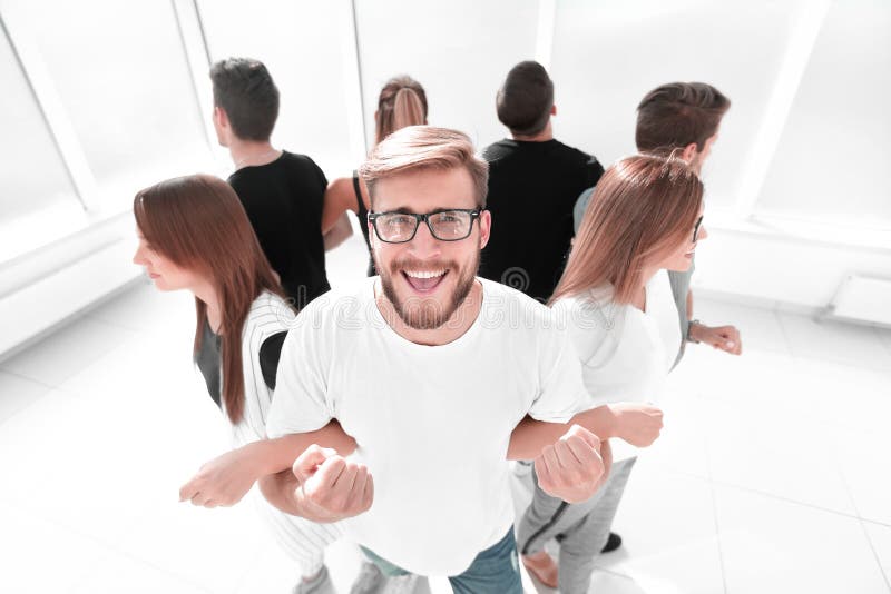 Young Man Standing in a Circle with a Business Team Stock Photo - Image ...