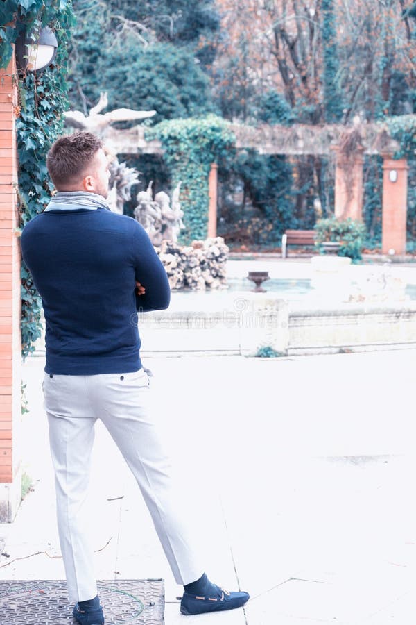Young Man Standing in the Park Looking into Infinity Stock Image ...