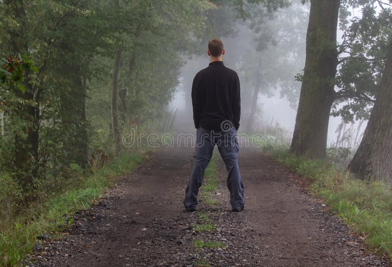 Young Man Standing on Path in Morning Misty Fog Stock Photo - Image of ...