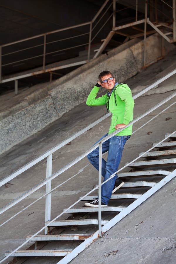 Young man on the steps stock image. Image of concept - 29426221