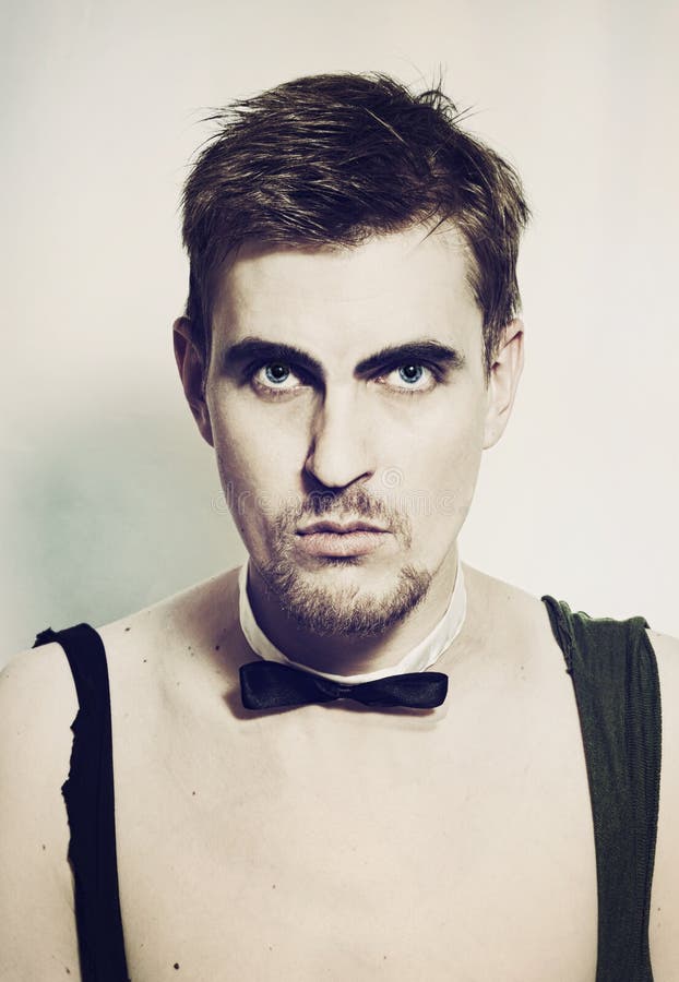 Young man with stern look stock photo. Image of attractive - 71923546