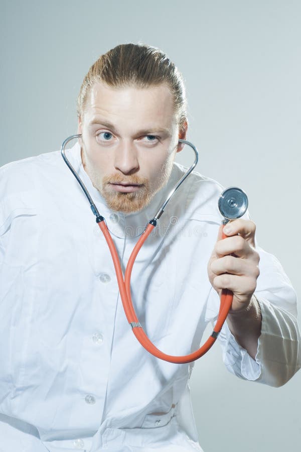 Young man with stethoscope stock photo. Image of stethoscope - 39501596