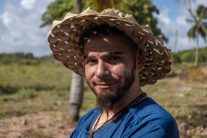 Young Man with Straw Hat in the Field. Gardener Working Stock Photo ...