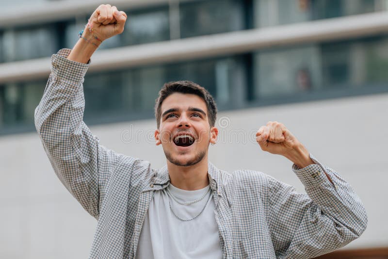 Young Man in the Street Celebrating Stock Image - Image of excited ...
