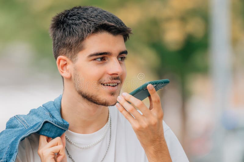 Young Man in the Street with Mobile Phone Stock Image - Image of male ...