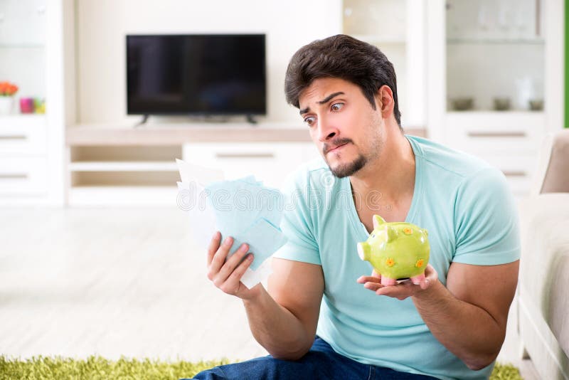 The Young Man Struggling with Personal Finance and Bills Stock Photo ...
